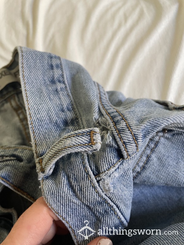 Extremely Worn Ripped Jeans